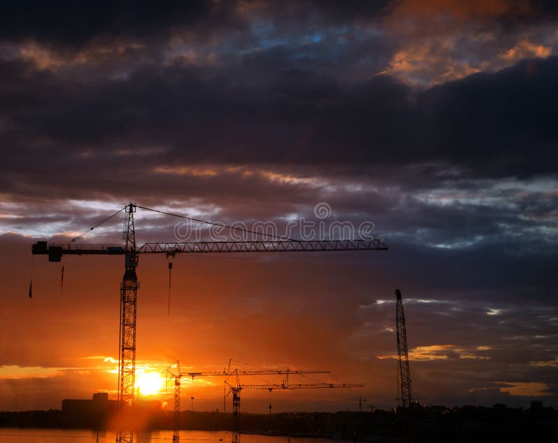 Crane at sunset stock photo. Image of growth, crane, city - 20986632