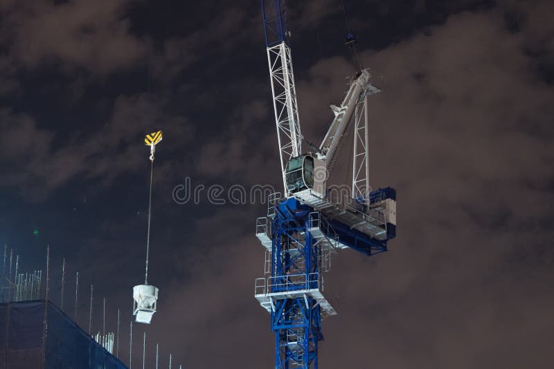 The Crane To Lift Objects on Top of the Building. Stock Image - Image ...