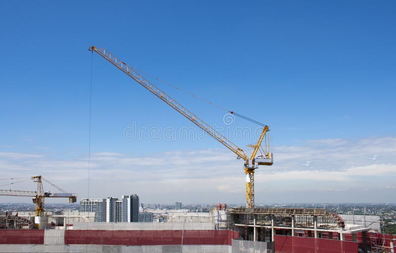 The Crane Tower in Construction Site of a High-rise Condominium Stock ...