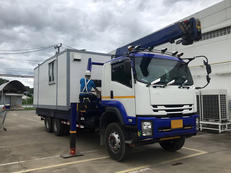 The Crane Trucks Transport the Mobile Office Buildings or Container ...
