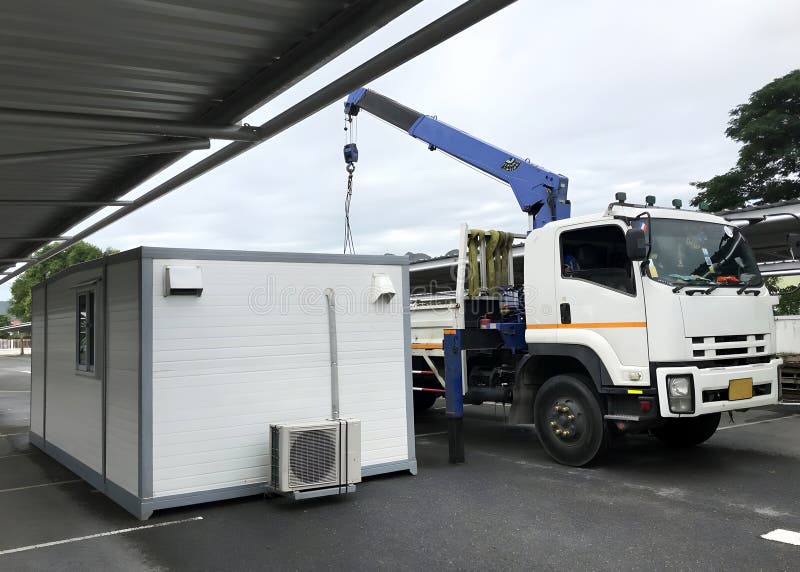 The Crane Trucks Transport the Mobile Office Buildings or Container ...