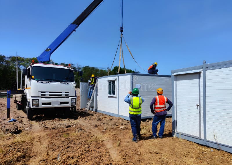 The Crane Trucks Transport the Mobile Office Buildings or Container ...
