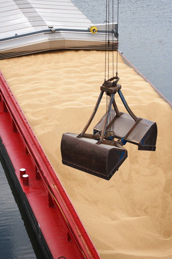 Crane unloading a barge stock image. Image of metal, reaching - 26342479