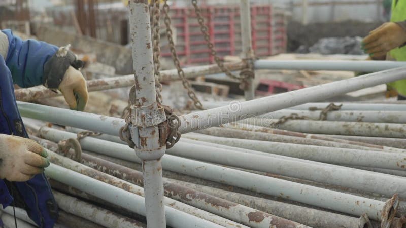 Crane Unloading Mechanism with Chains and Hooks. Unloading ...