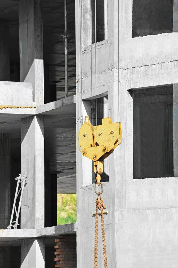 Crane winch with hook stock photo. Image of estate, equipment - 93545412