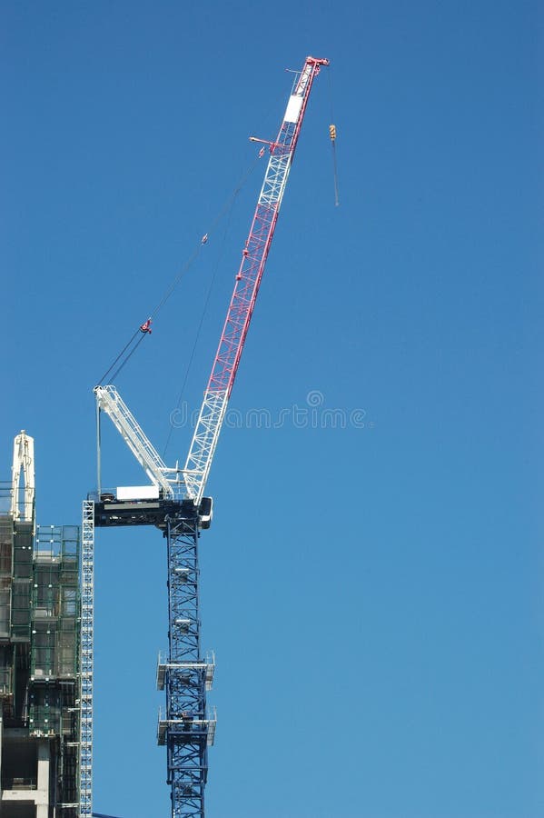 Cranes at work stock image. Image of city, urban, lifting - 33175919