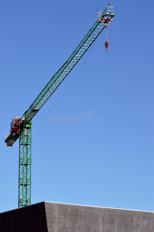 Crane at work stock photo. Image of equipment, hook, lifting - 89590566