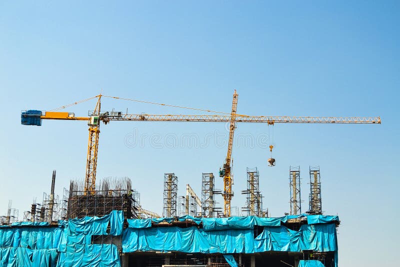 Crane Working in Construction Site Stock Image - Image of plans ...