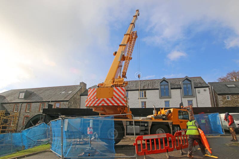 Crane Working on a Building Site Editorial Stock Photo - Image of ...