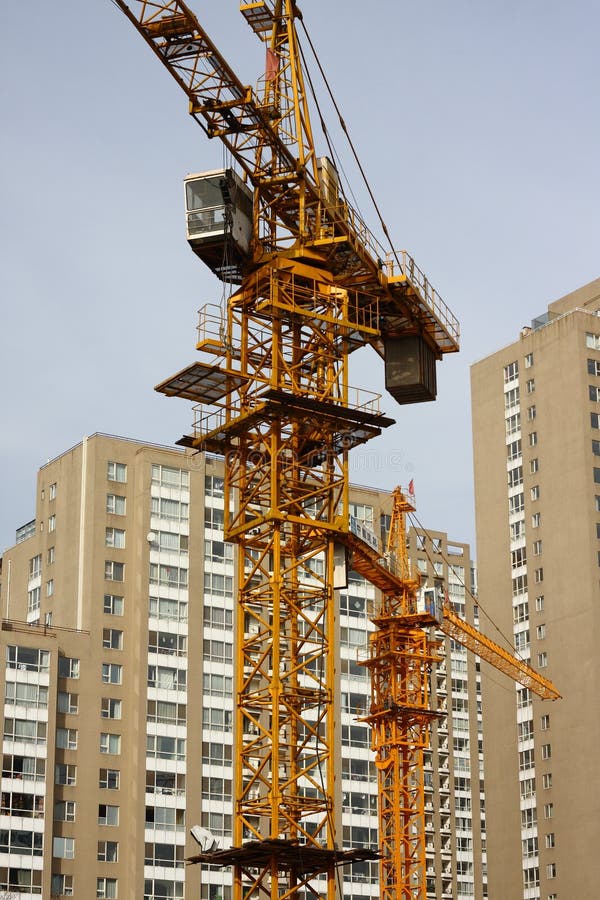 Cranes at Construction Site Stock Photo - Image of apartment, heavy ...