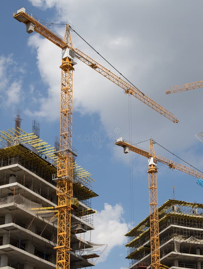 Cranes on a Construction Site Stock Photo - Image of silhouette ...