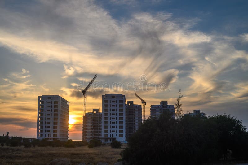 Cranes at Construction Site at Sunset 1 Stock Photo - Image of city ...