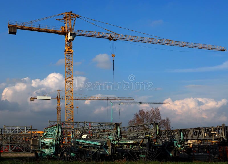 Cranes on a Field Ready for Work Stock Image - Image of construction ...