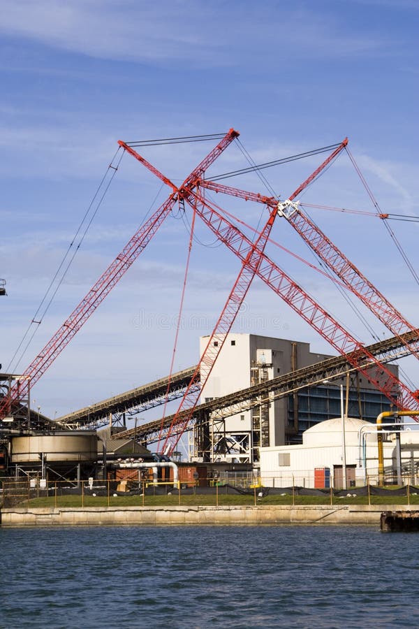 Cranes in industrial area stock image. Image of vent - 13380985