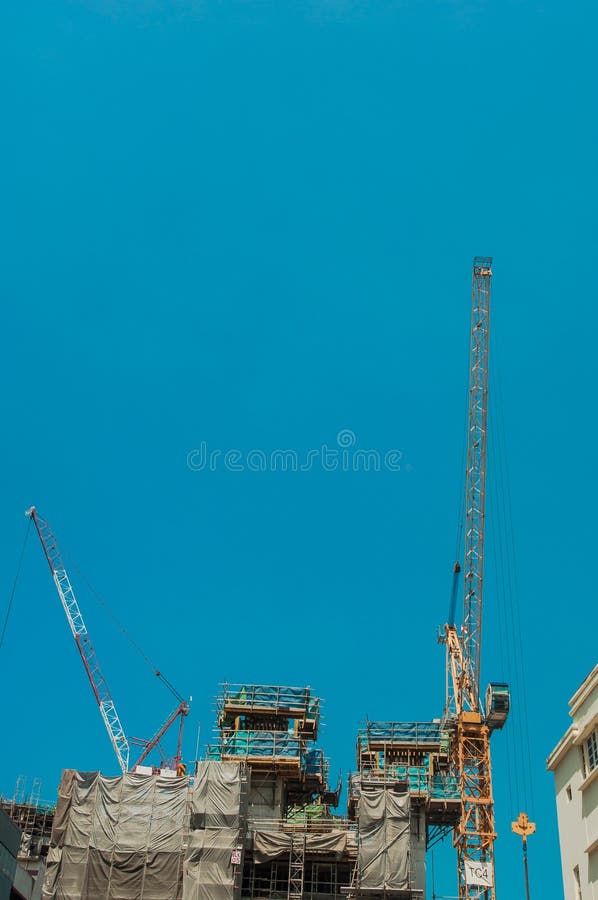 Cranes and Levers for Contruction Work in City Stock Image - Image of ...