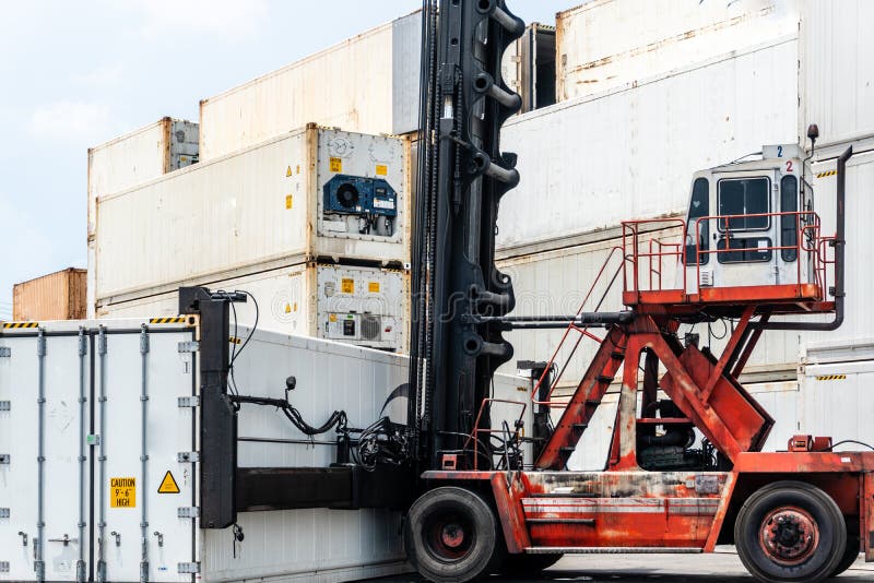 Cranes are Lifting Containers Stacked in Several Layers Stock Image ...