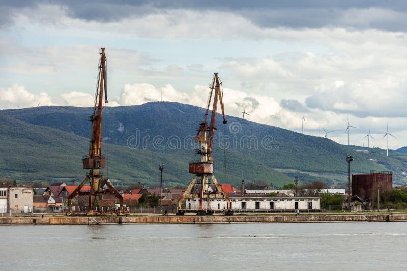 Cranes in an Old Small Industrial Port on the Danube River Stock Image ...