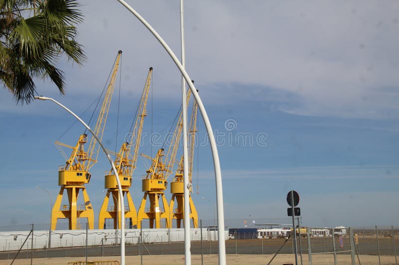 Cranes at the Port for Unloading and Loading of Heavy Vessels Stock ...