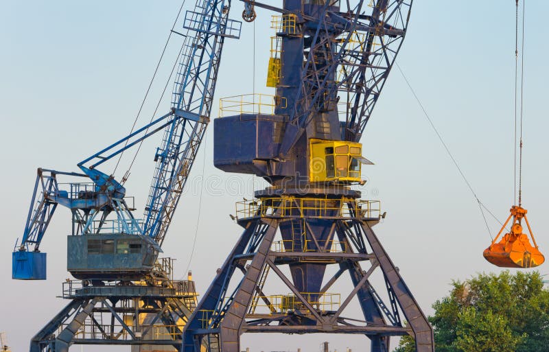 Cranes at river port stock image. Image of international - 35480949