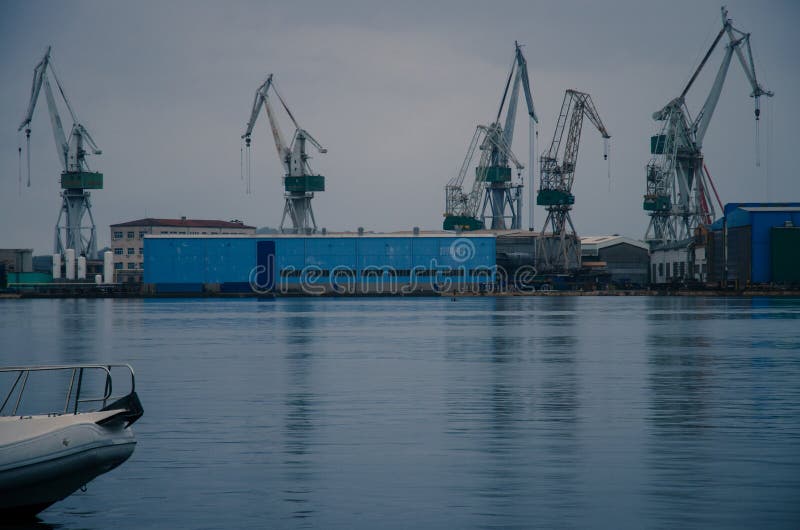 Cranes in shipping port editorial image. Image of port - 71531695