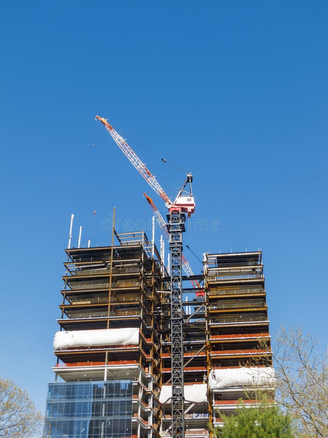 Cranes on Top of New Tower Construction Stock Image - Image of site ...