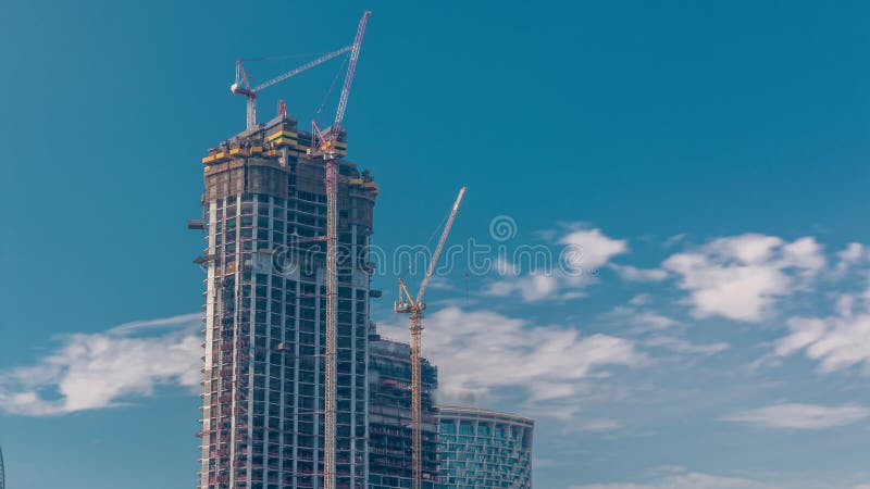 Cranes Working on Modern Constraction Site Works of New Towers ...