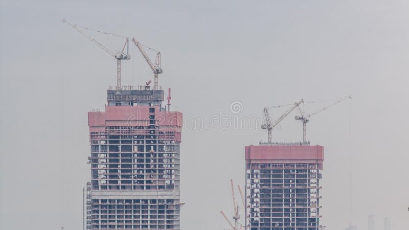 Cranes Working on Modern Constraction Site Works of New Towers ...