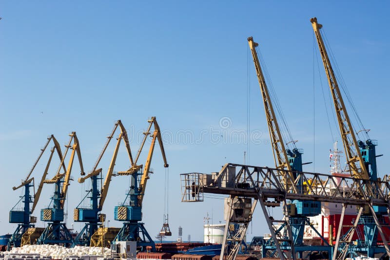 Cranes working in port stock image. Image of transportation - 59601381