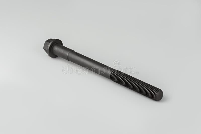The Crankshaft Mounting Bolt on a Gray Background. Cylinder Head ...