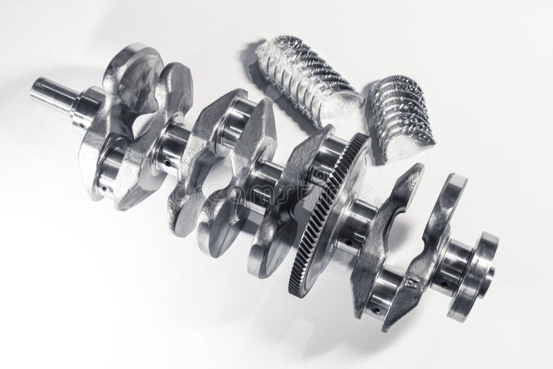 Crankshaft and New Kit of Main Bearing Set on the White Background ...