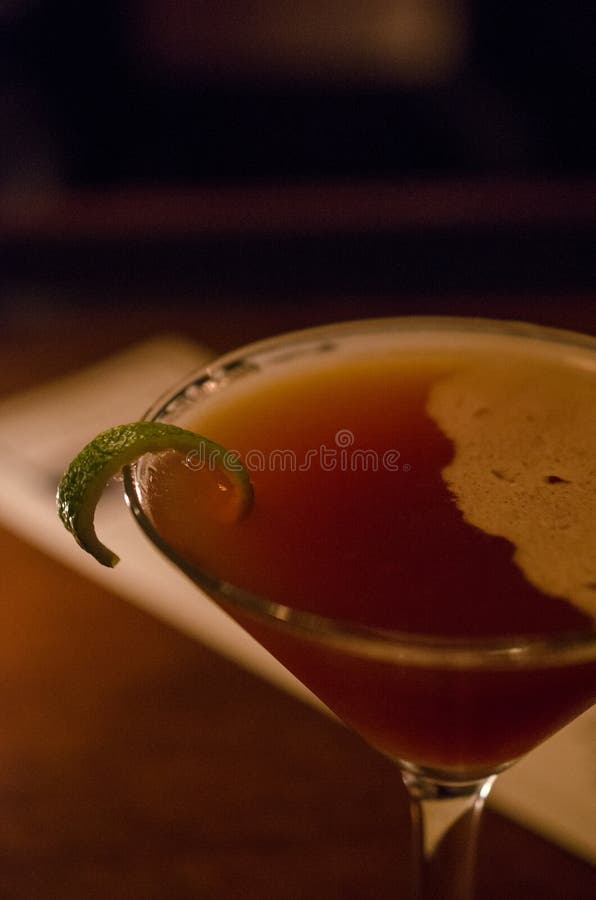 Crantini stock photo. Image of cranberry, booze, twist - 44214572