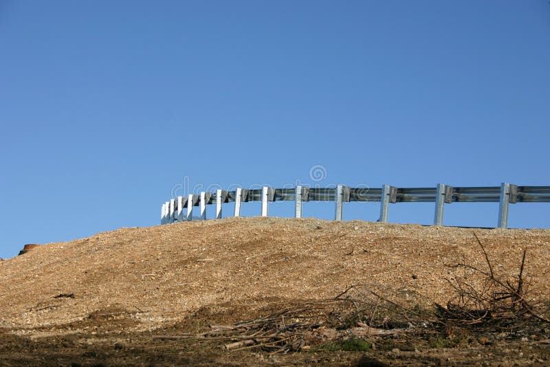Crash Barrier with Pebbles, Asphalt Road Circuit and Safety Fence on ...