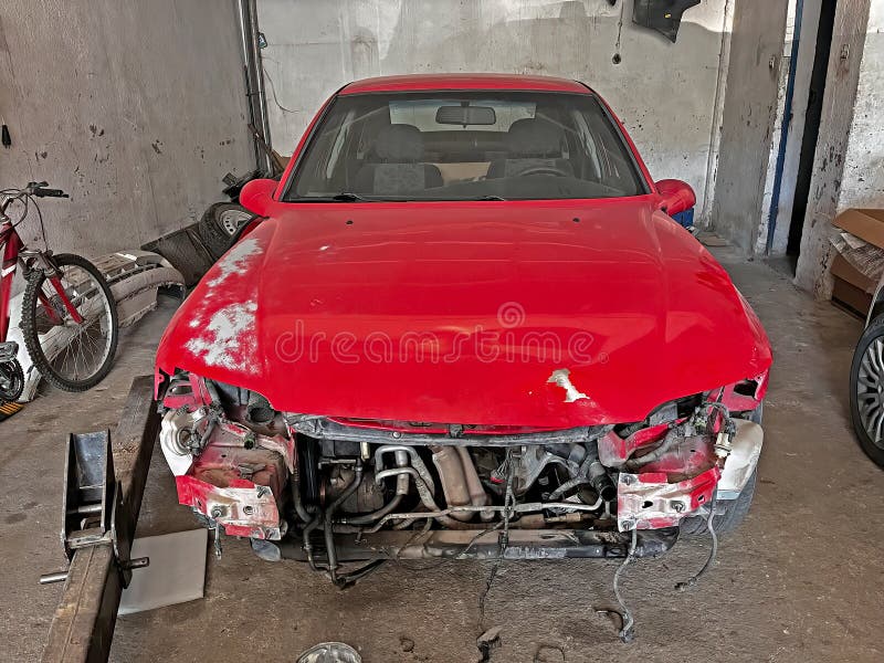Crashed car in the garage stock photo. Image of explosion - 352523530