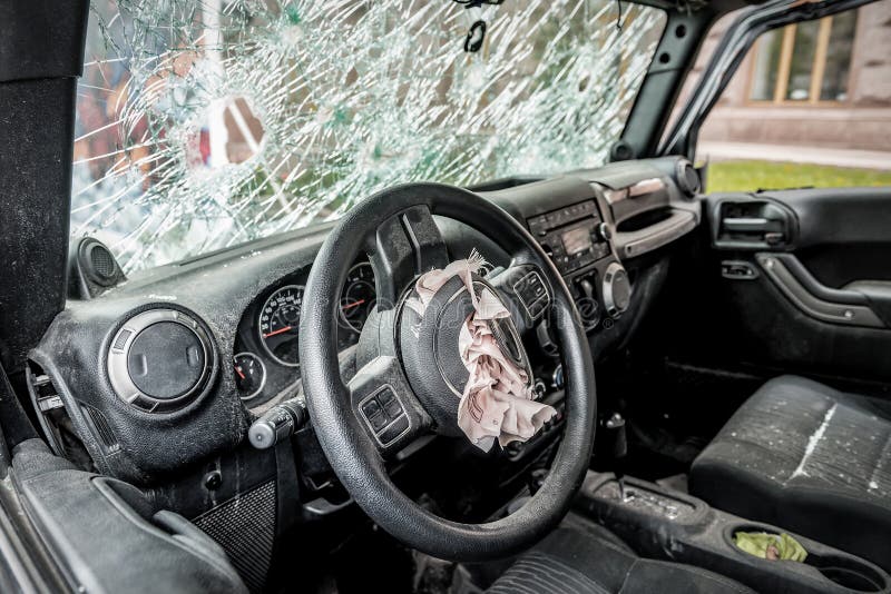 Crashed Car Interior after an Accident. Cracked Windshield, Deployed ...