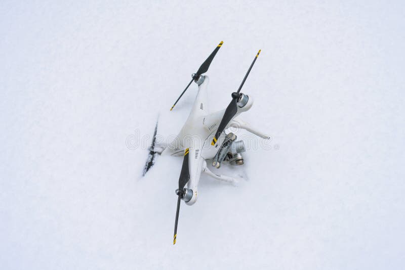 The Crashed Drone. Fallen in Snow. Phantom 3. Stock Photo - Image of ...