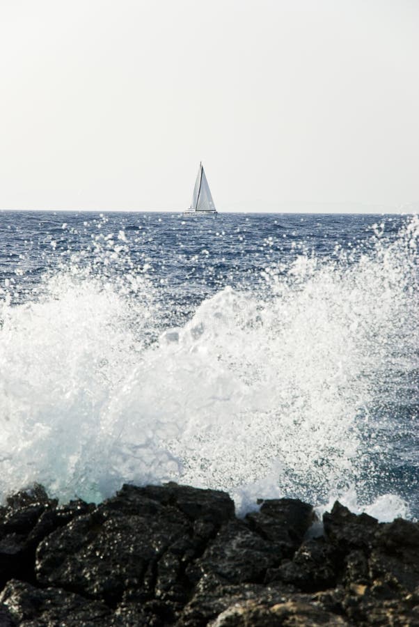 Crashing Wave And Sailing Boat Stock Photo - Image of color, blue: 15102078