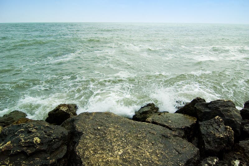 Crashing Waves Against Rocks on Shoreline. Stock Image - Image of ...