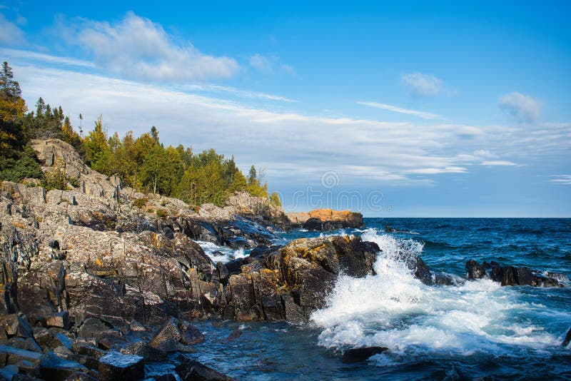 Crashing Waves at a Rocky Beach Stock Photo - Image of ocean, blue ...