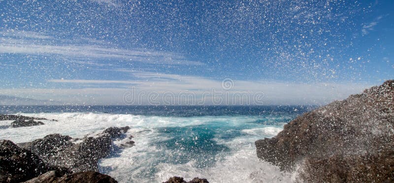 Crashing Waves Splashing Over the Rocks Stock Image - Image of clear ...