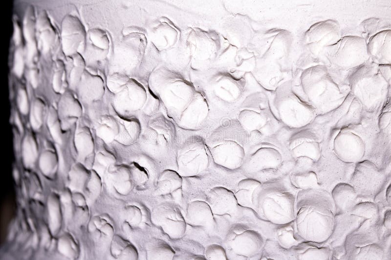 Crater Holes and Dips in Pottery Clay in a Thick White Texture Dots ...