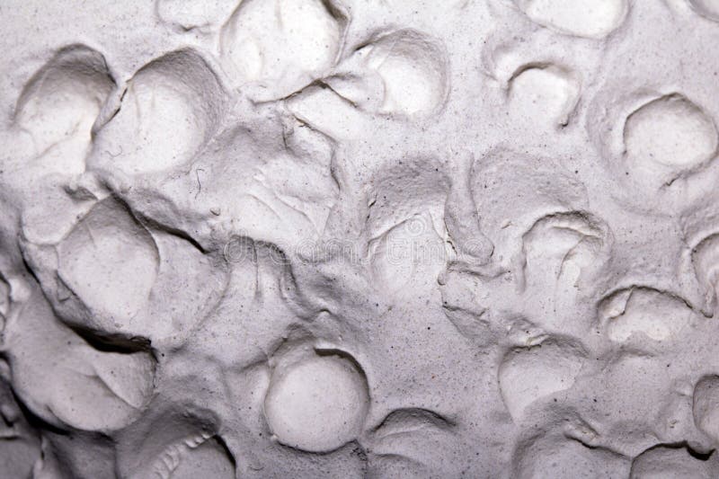 Crater Holes and Dips in Pottery Clay in a Thick White Texture Dots ...