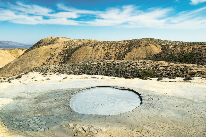 Crater of mud volcano stock photo. Image of colorful - 71035670