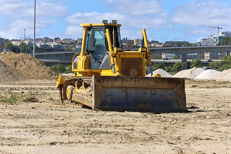 Crawler Bulldozer Tractor on the Muddy Ground Stock Photo - Image of ...