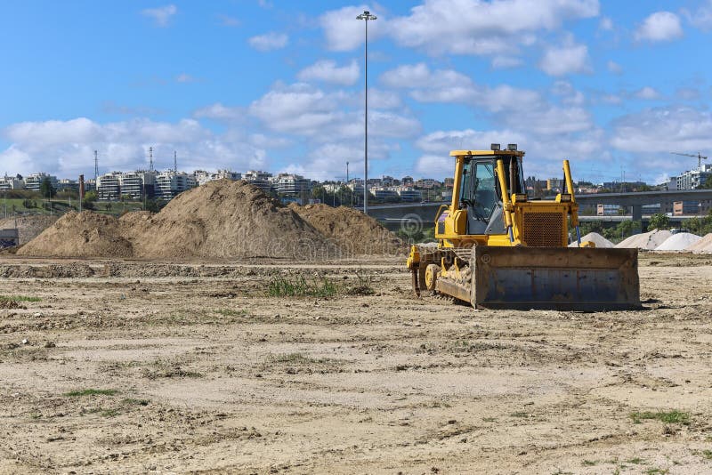 Crawler Bulldozer Tractor on the Muddy Ground Stock Image - Image of ...