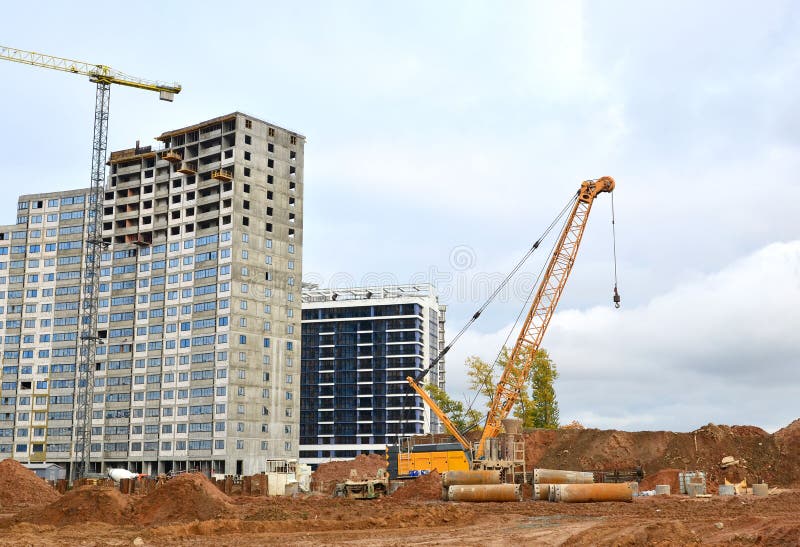 Crawler Crane at the Construction Site. Digging a Pit for the Building ...