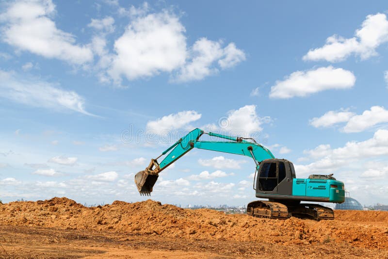 Excavator is Digging in the Construction Site Pipeline. Stock Photo ...