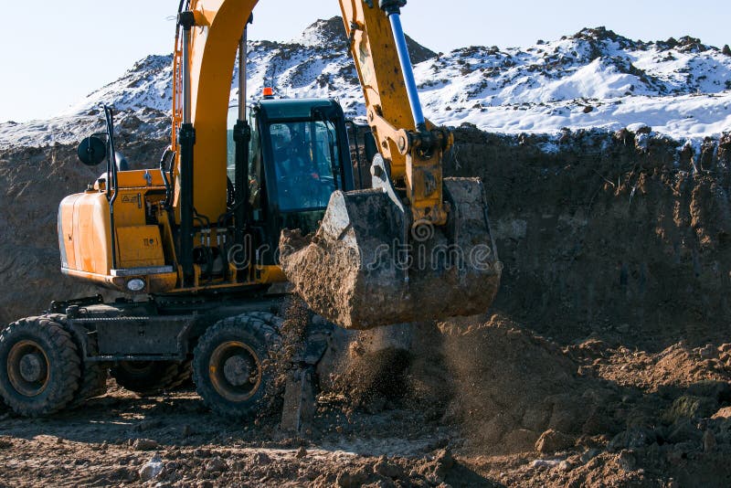 Crawler Excavator. Earth-moving Machine at a Construction Site. Stock ...