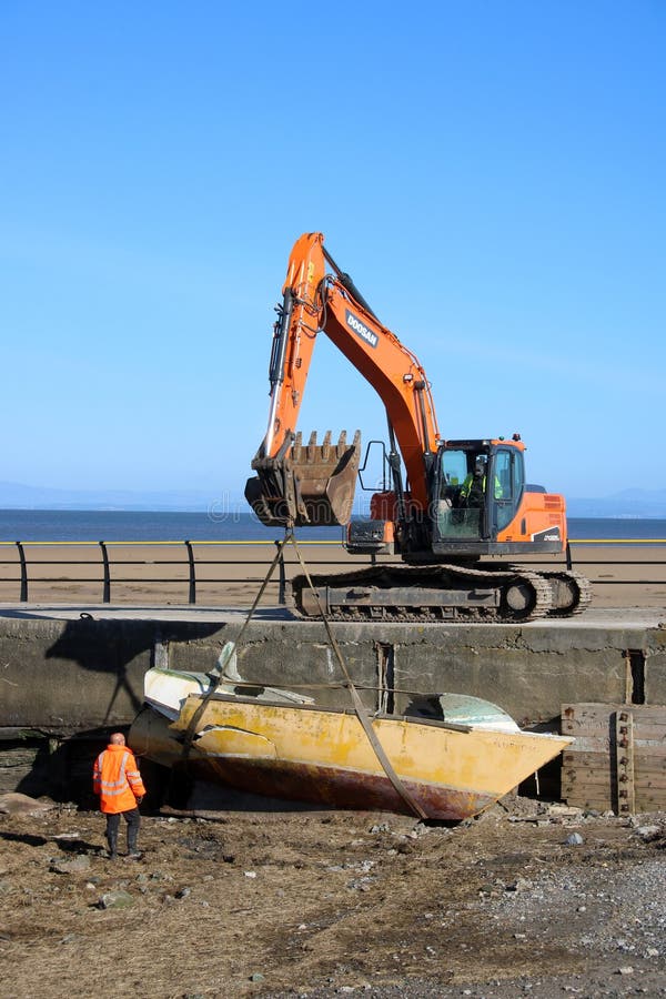 Crawler Excavator Removing Boat Wreck from Shore Editorial Photo ...