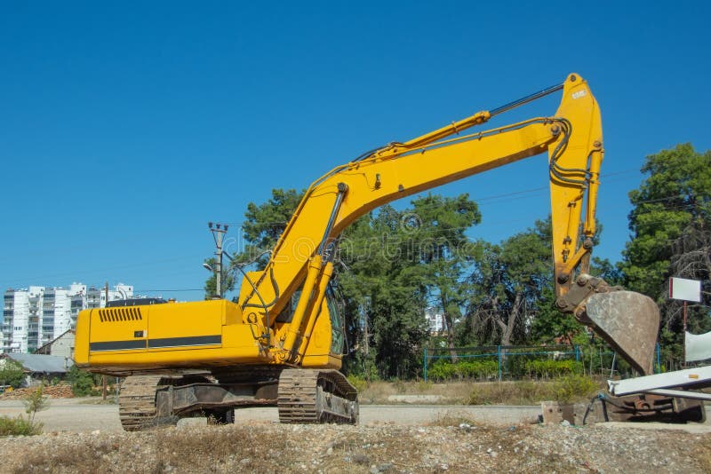 Crawler Excavator, Side View Digs in a Trench Stock Image - Image of ...