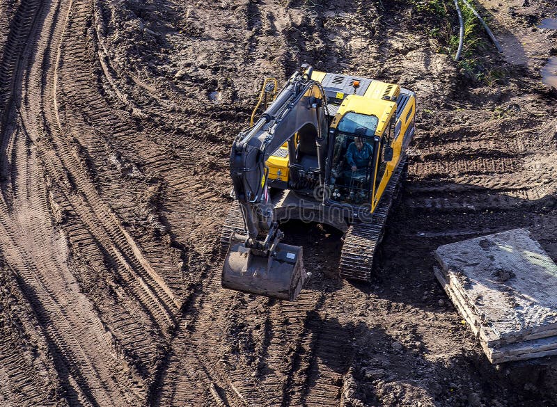 A Crawler Excavator Stands on a Construction Site. View from Above ...